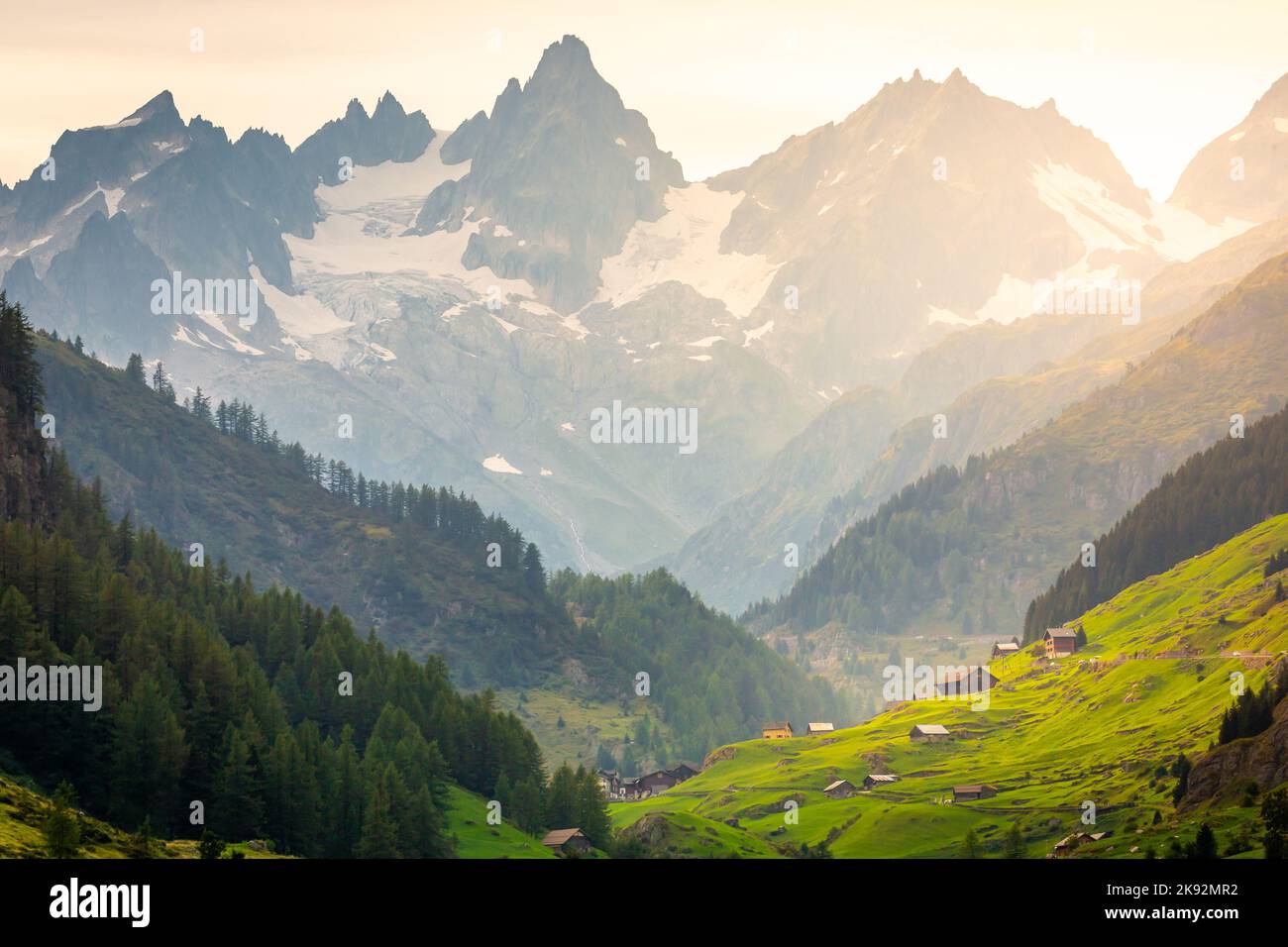 Alpine village and farms, Bernese Oberland swiss alps landscape ...