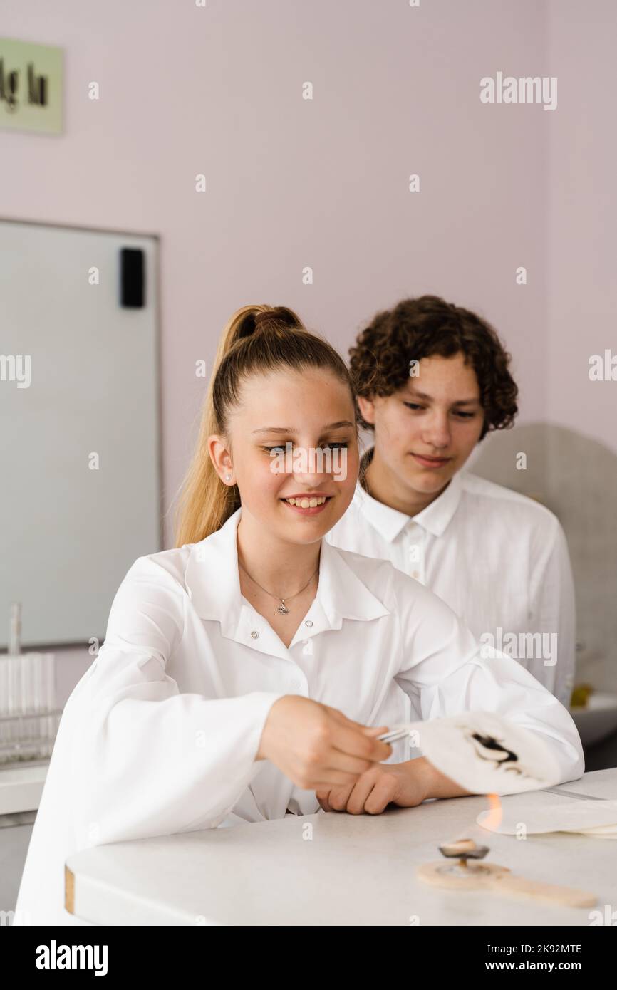 Education. Chemical experiments at a chemistry lesson at school ...