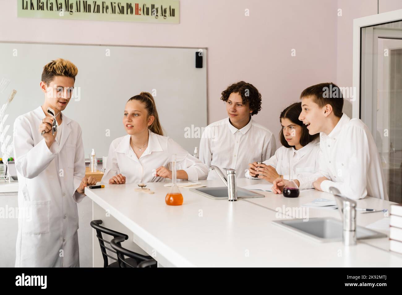 Education. Chemical experiments at a chemistry lesson at school ...