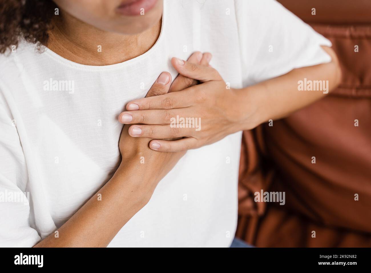 Heart attack disease of african american woman. Symptoms of angina ...