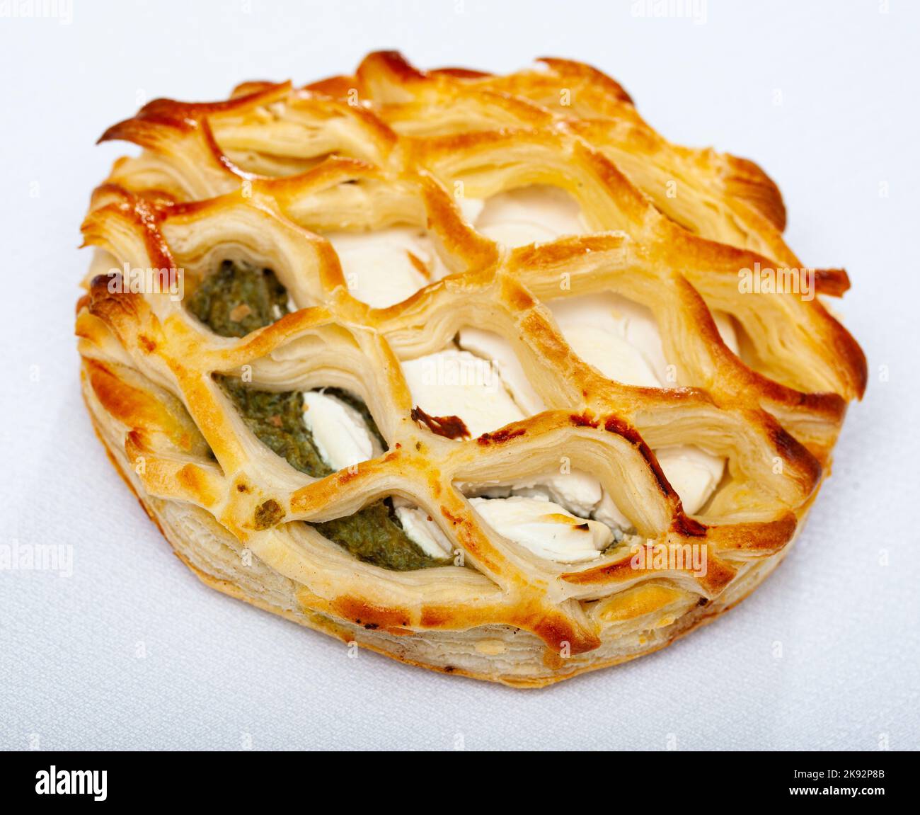One puff with spinach and goat cheese Stock Photo - Alamy