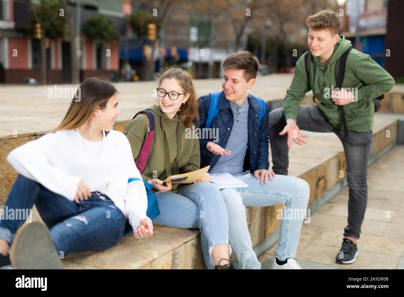 Group of positive teenagers having fun together Stock Photo - Alamy