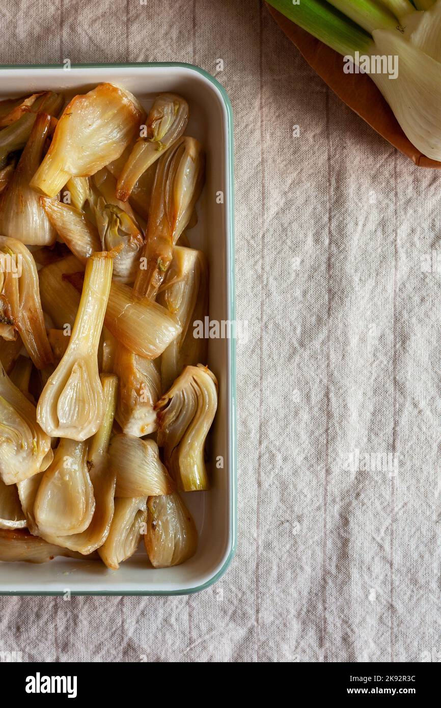 baked fennel dish on a kitchen table, top view, copy space Stock Photo ...