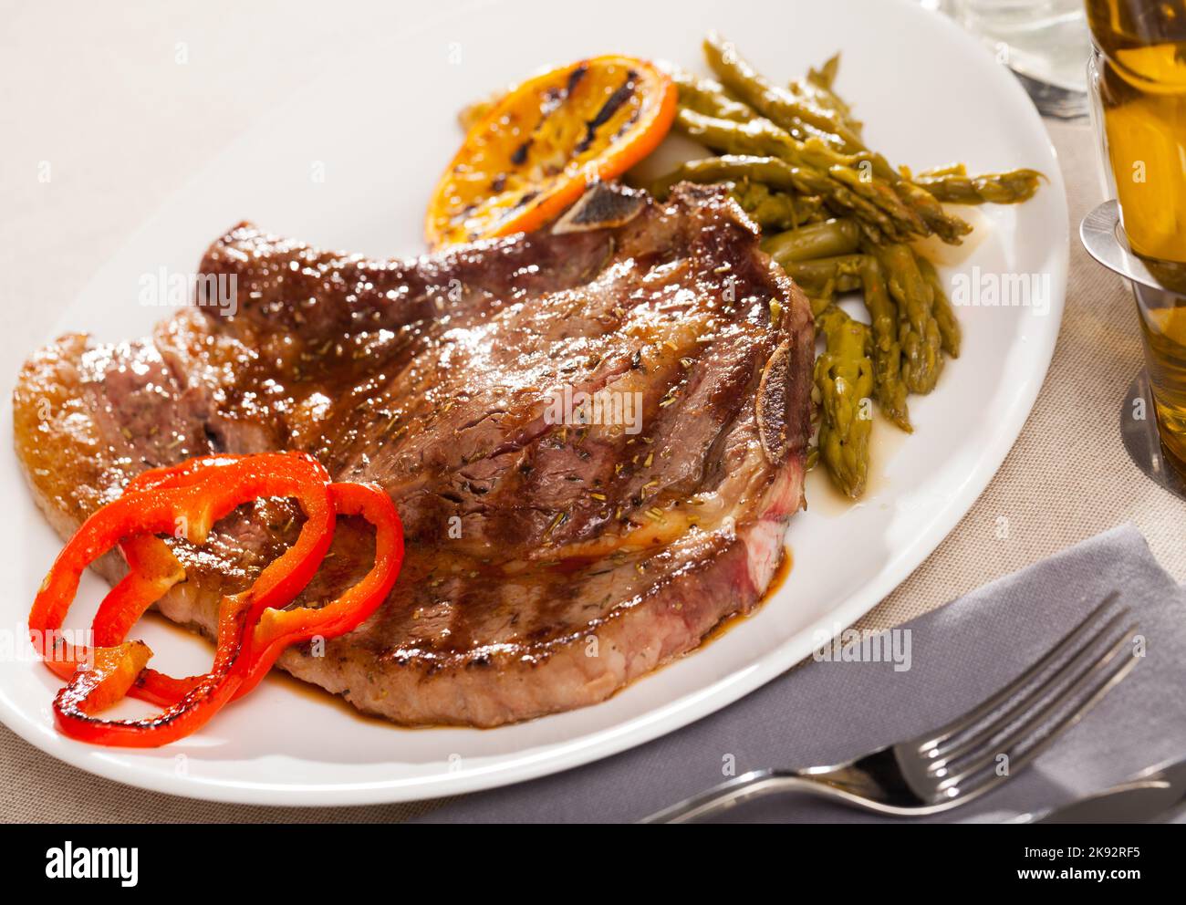 Appetizing beef steak with asparagus Stock Photo - Alamy