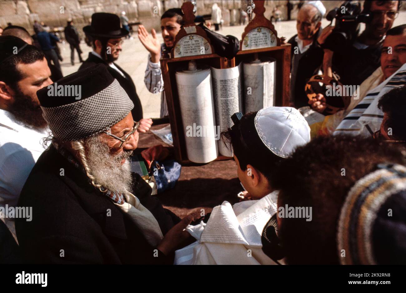 JERUSALEM - JAN 1, 1994: Orthodox jewish men pray at the Western Wall ...