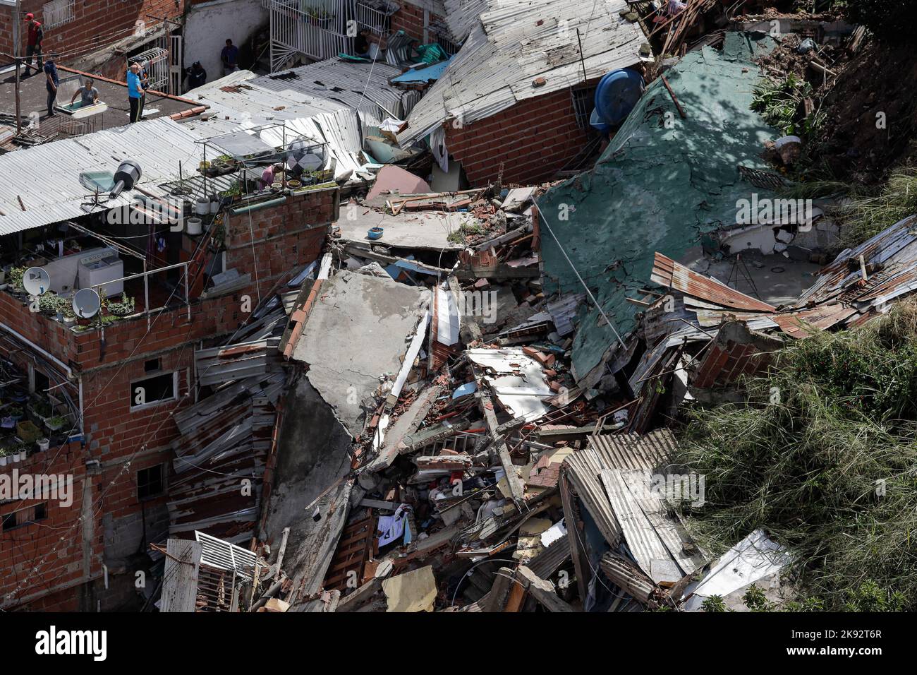 Caracas, Venezuela. 25th Oct, 2022. Houses are destroyed by a landslide ...