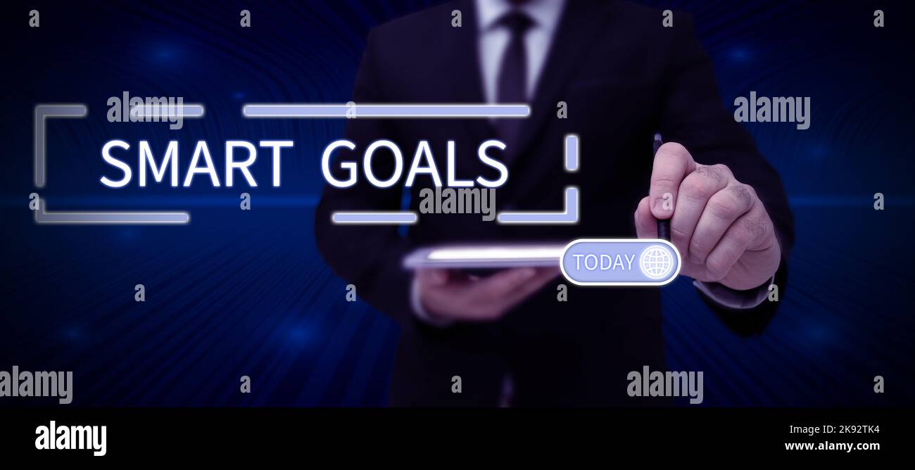 Hand writing sign Smart Goals. Word for mnemonic used as a basis for ...