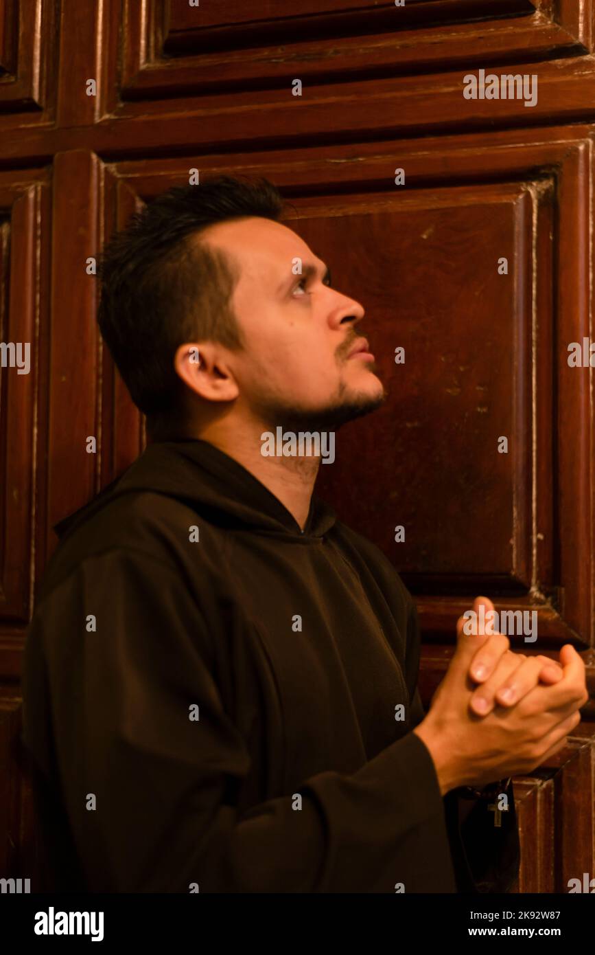 Salvador, Bahia, Brazil - June 16, 2022; Catholic friar praying against ...