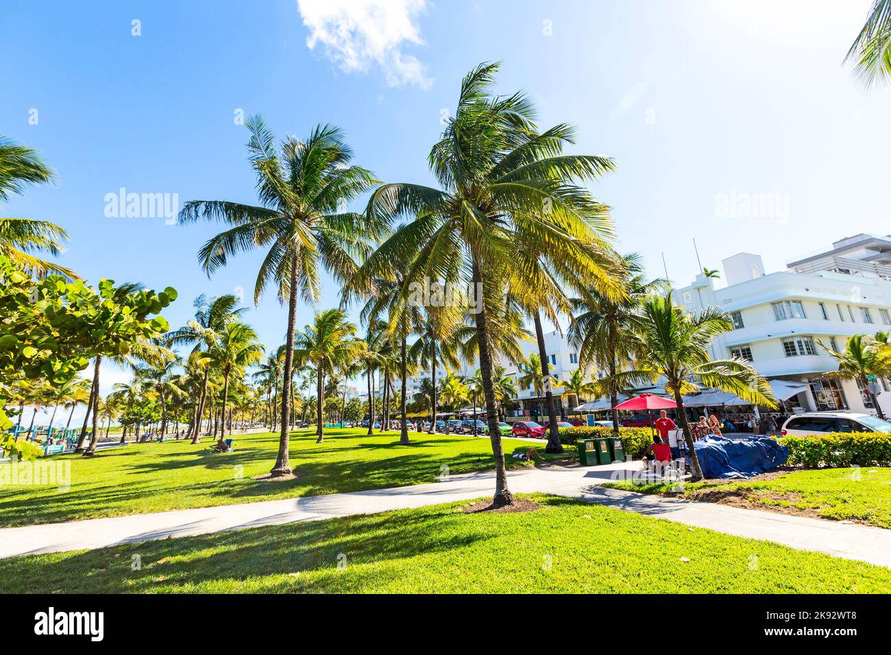 Miami, USA - AUG 1, 2013: people relaxing at beautiful Miami Beach ... Miami, USA - AUG 1, 2013: people relaxing at beautiful Miami Beach ...