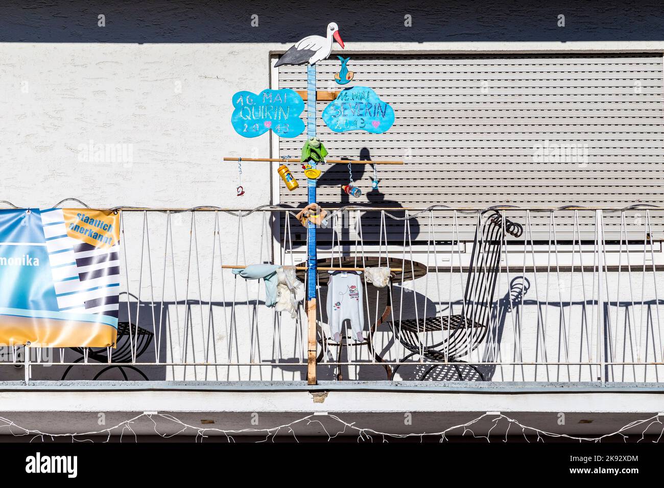 MUNICH, GERMANY - DEC 27, 2013: proud parents show with the symbol ...