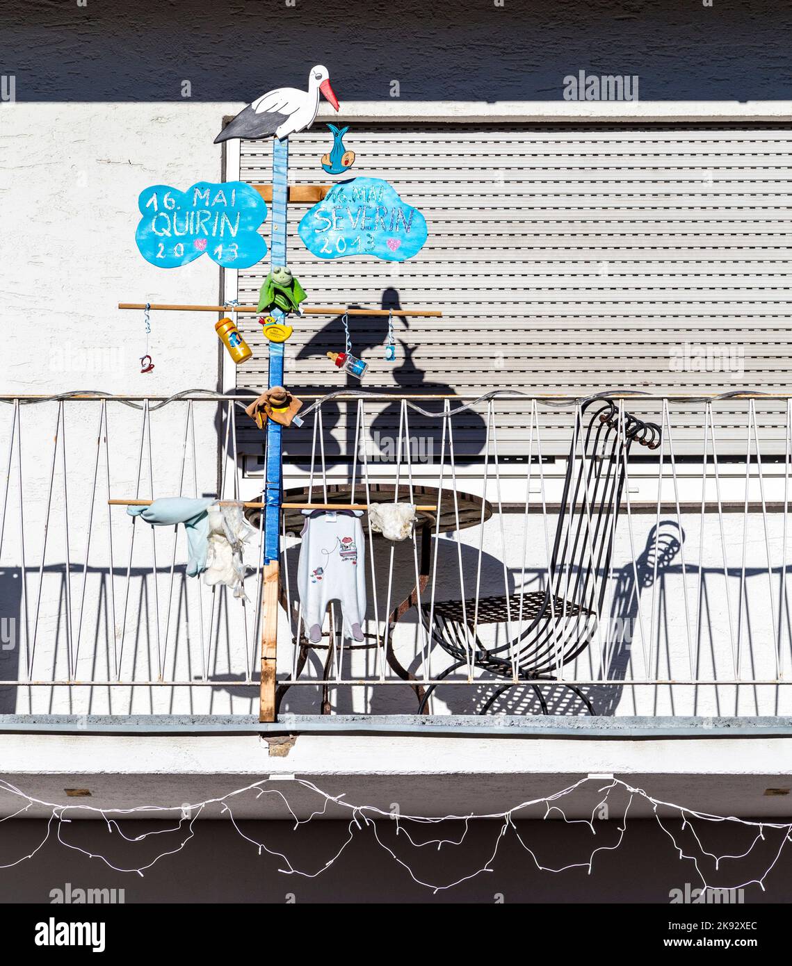MUNICH, GERMANY - DEC 27, 2013: proud parents show with the symbol ...