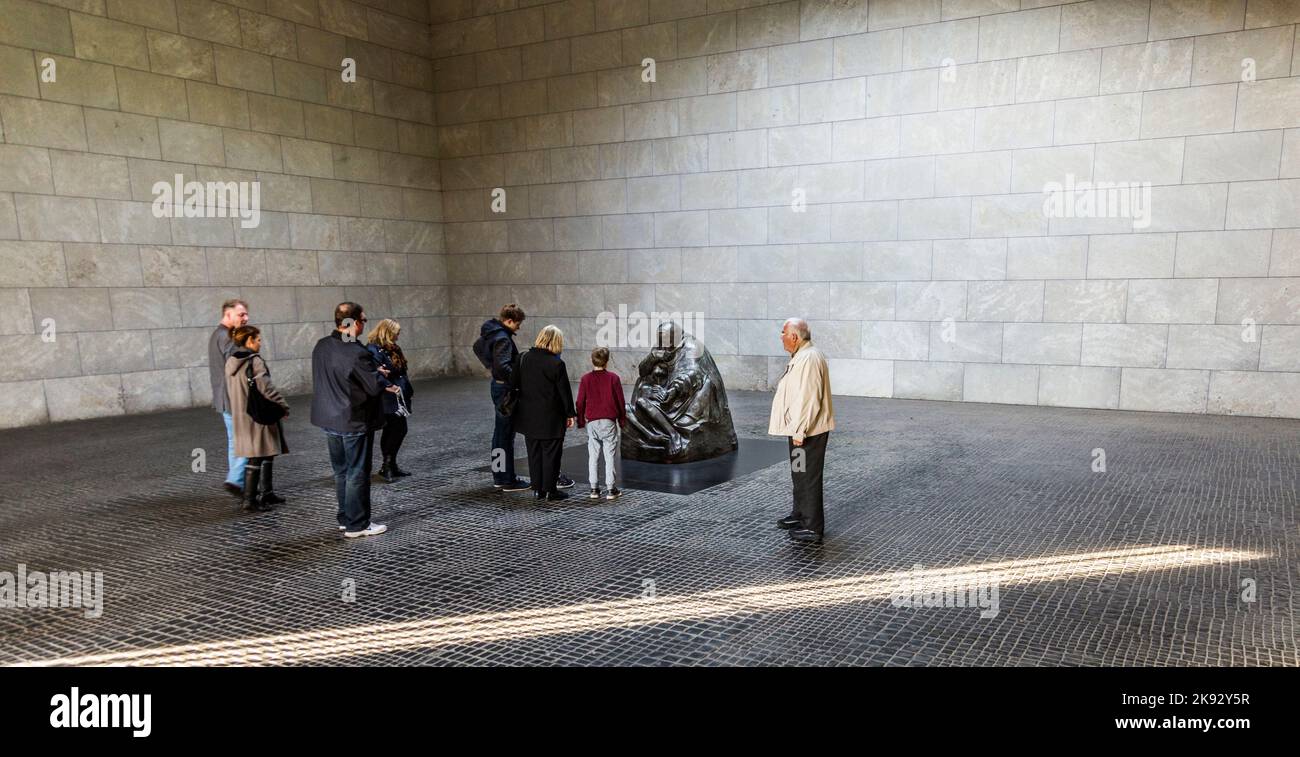BERLIN, GERMANY - OCT 27, 2014: people visit sculpture mother with her ...