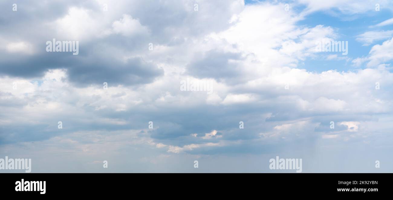Deep cloud layer of a beautiful blue sky with glimpses of the sun Stock ...