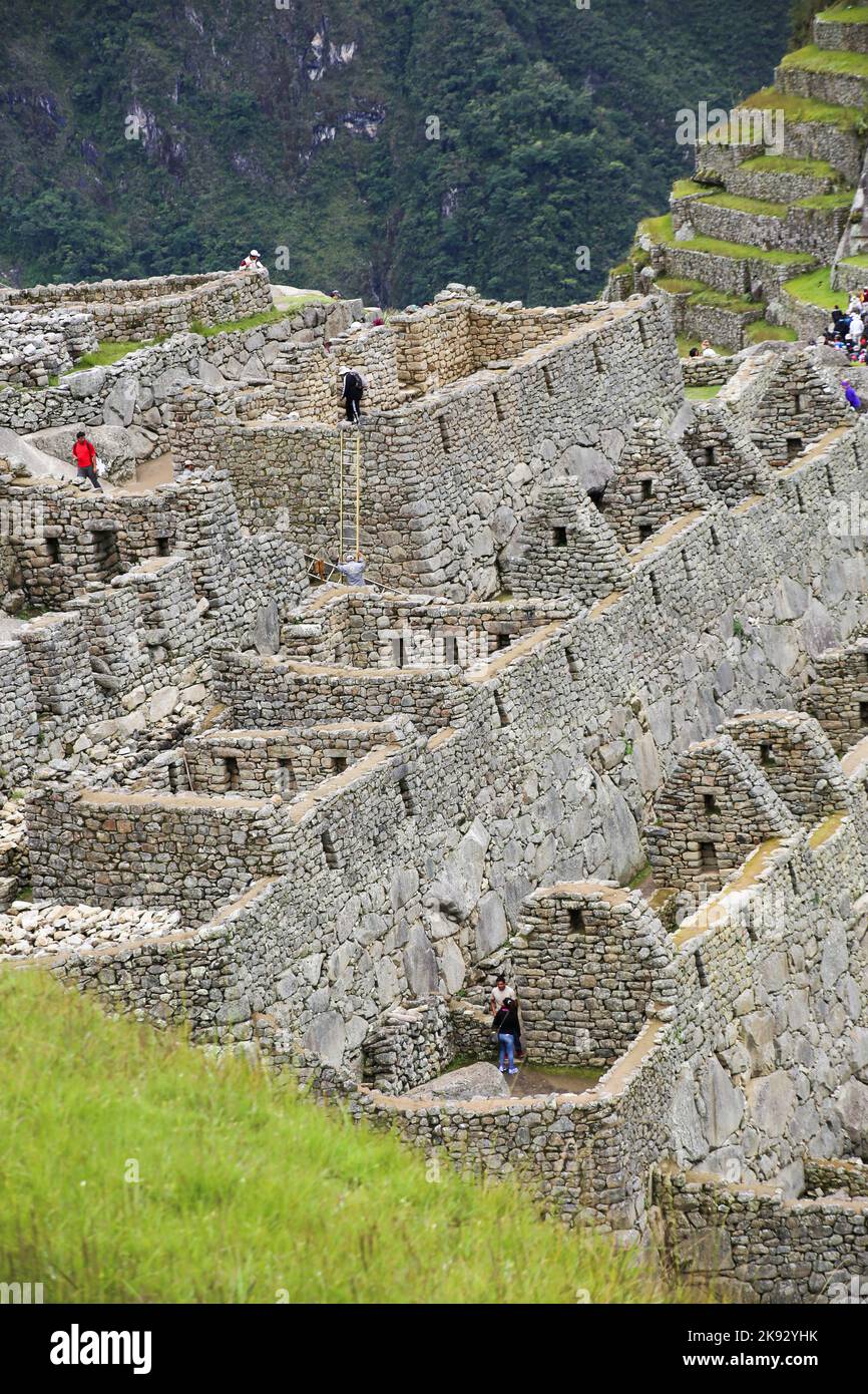 MACCU PICHU, PERU - JAN 17, 2015: people visit Beautiful hidden city ...
