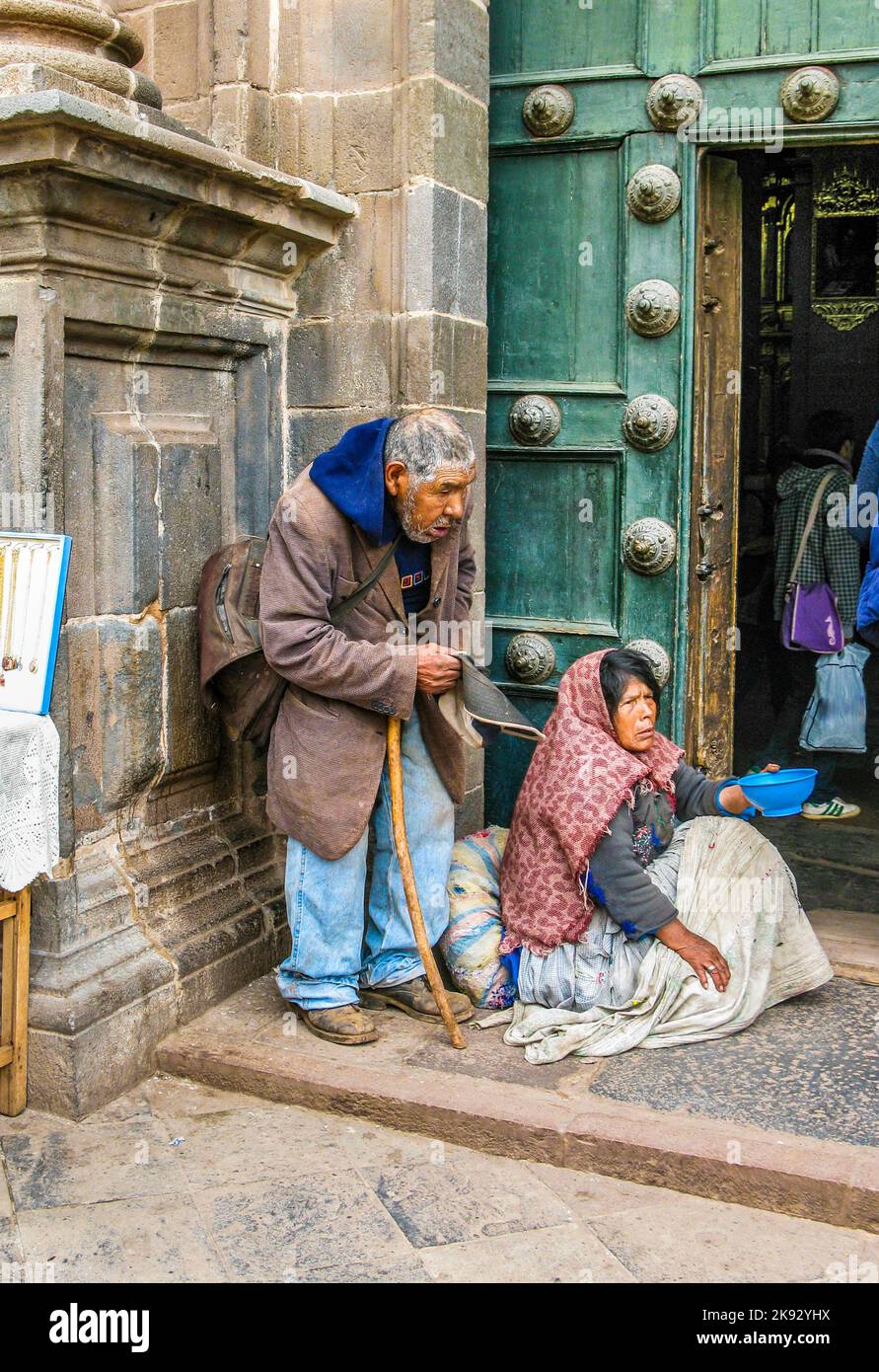 CUSZO, PERU - JAN 16, 2015: homeless indian woman begs for money in ...