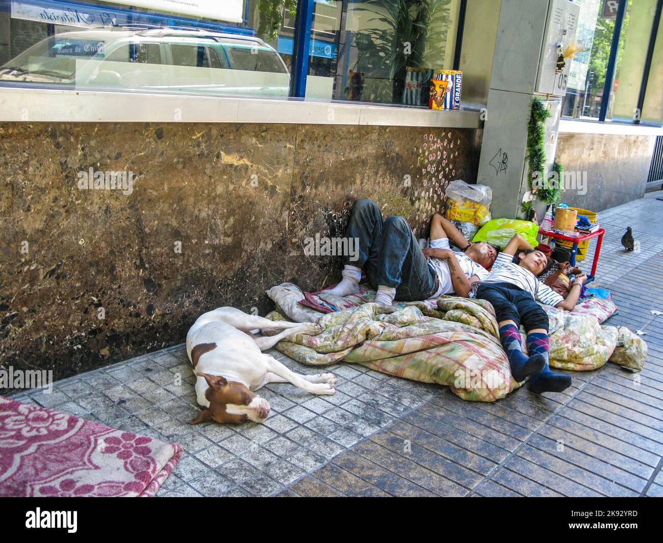 Two homeless people sleep in hi-res stock photography and images - Alamy