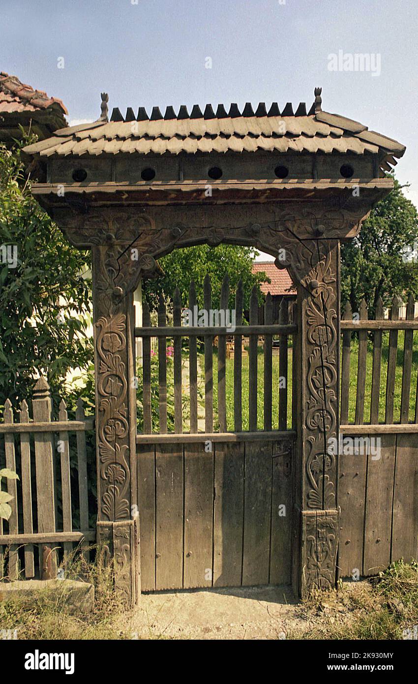 Covasna County, Romania, approx. 2000. Traditional wooden gate ...