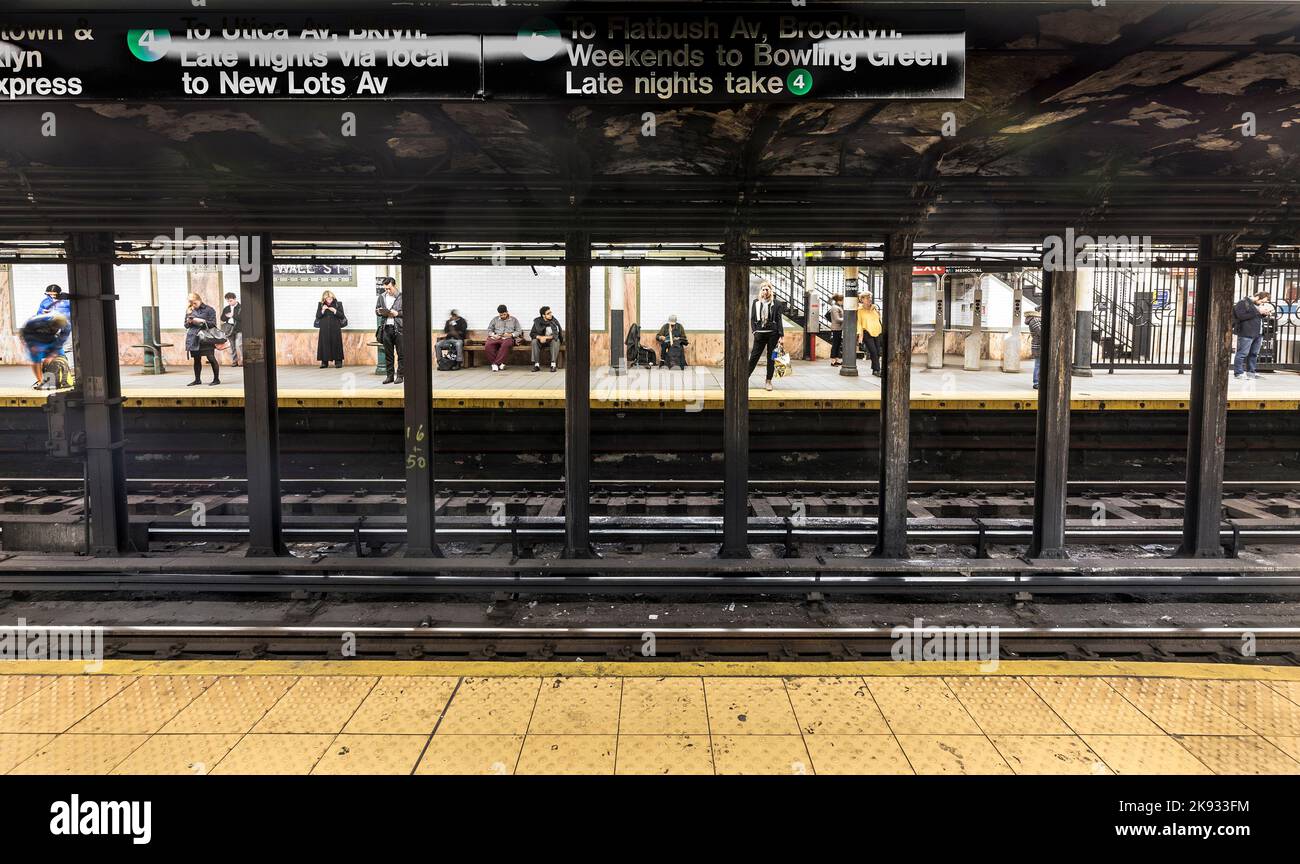 NEW YORK, USA - OCT 20, 2015: People wait at subway station Wall street ...