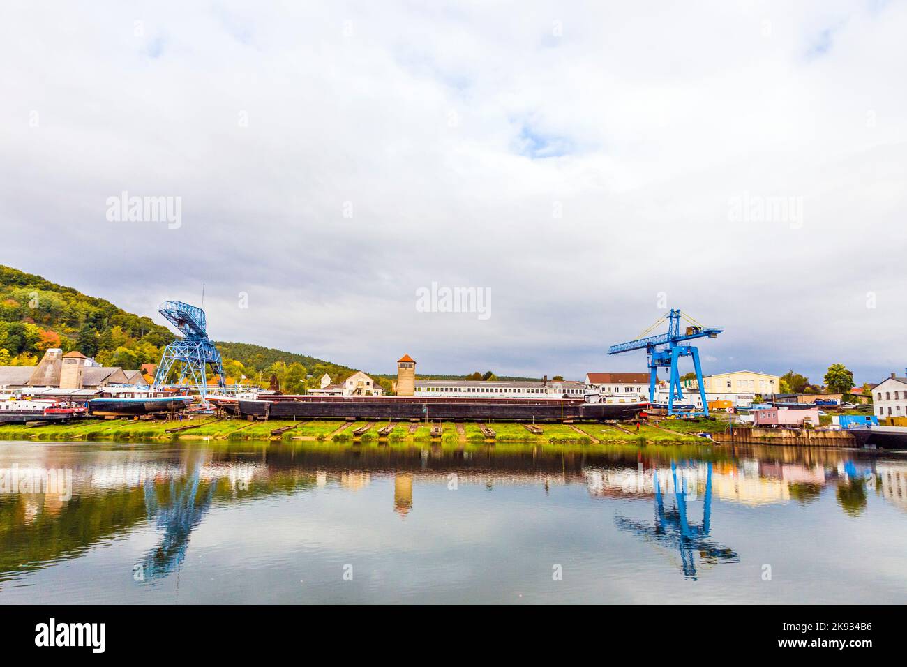 ERLENBACH, GERMANY - OCT 6: crane and wharf at river Main on October 6 ...