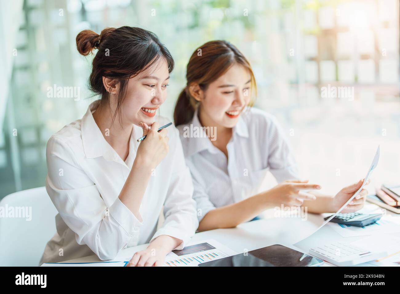 Negotiation, Analysis, Discussion: Portrait of an Asian woman economist ...