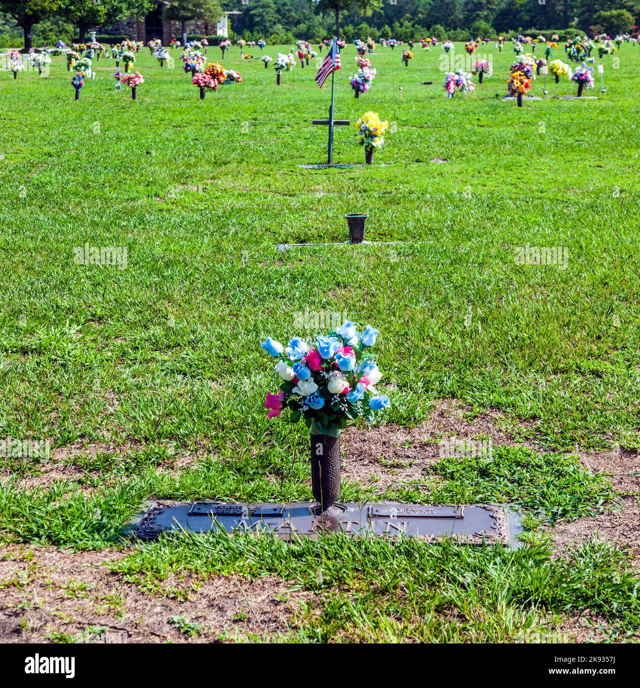 SVANSBORO, USA - JULY 20: american cemetery with flowers at the graves ...