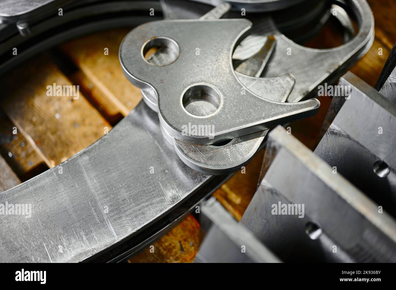 Processed metal plates with ground edges in warehouse Stock Photo - Alamy