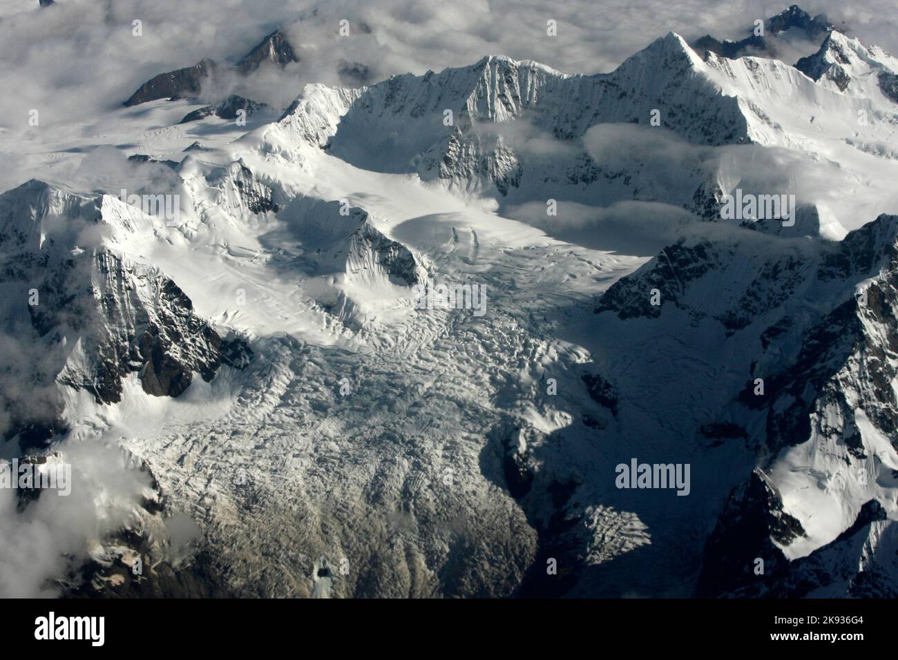 A glacier flows from mountains in the Tibetan Plateau Stock Photo - Alamy