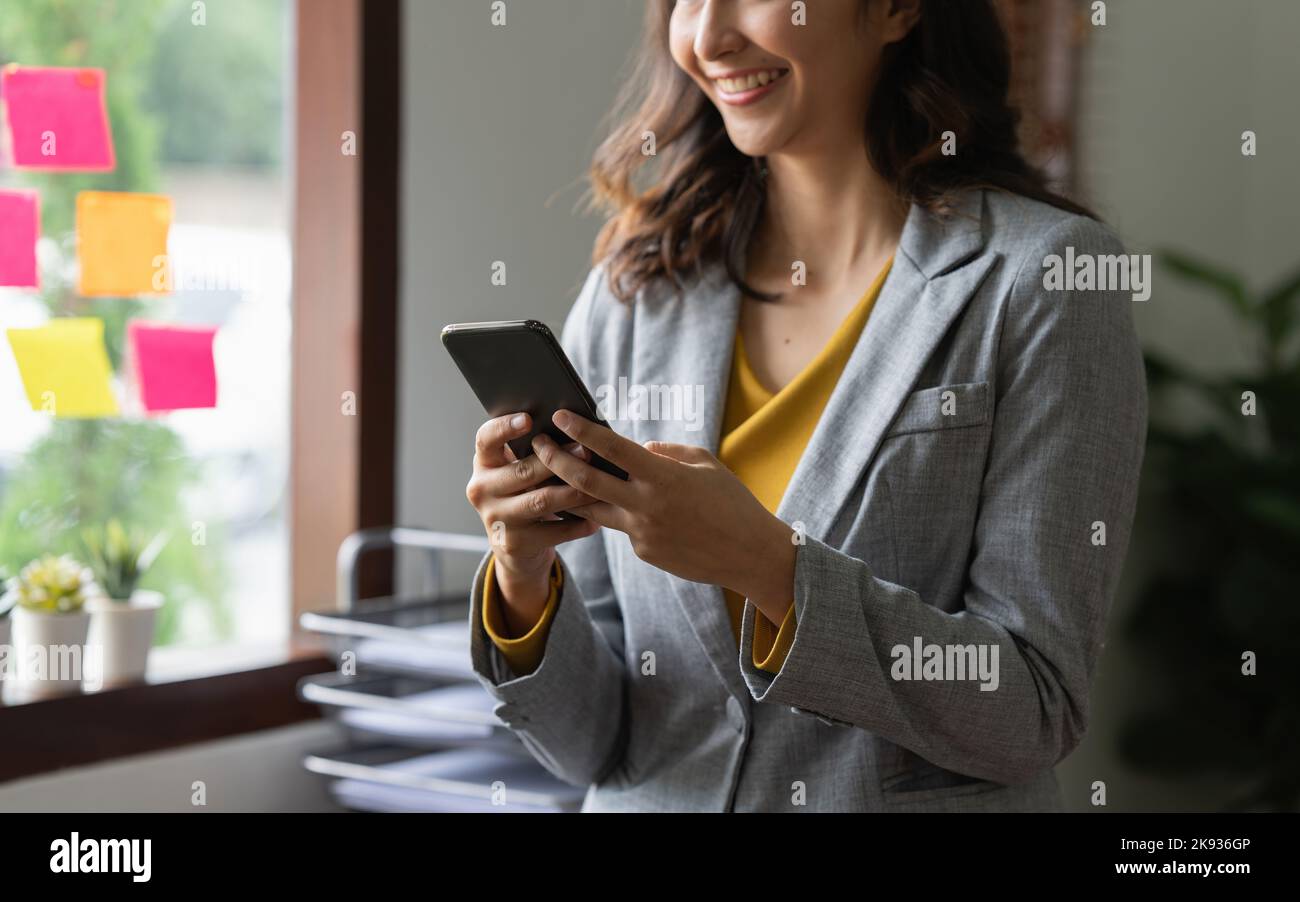 Beautiful asian businesswoman working in office. business finance ...