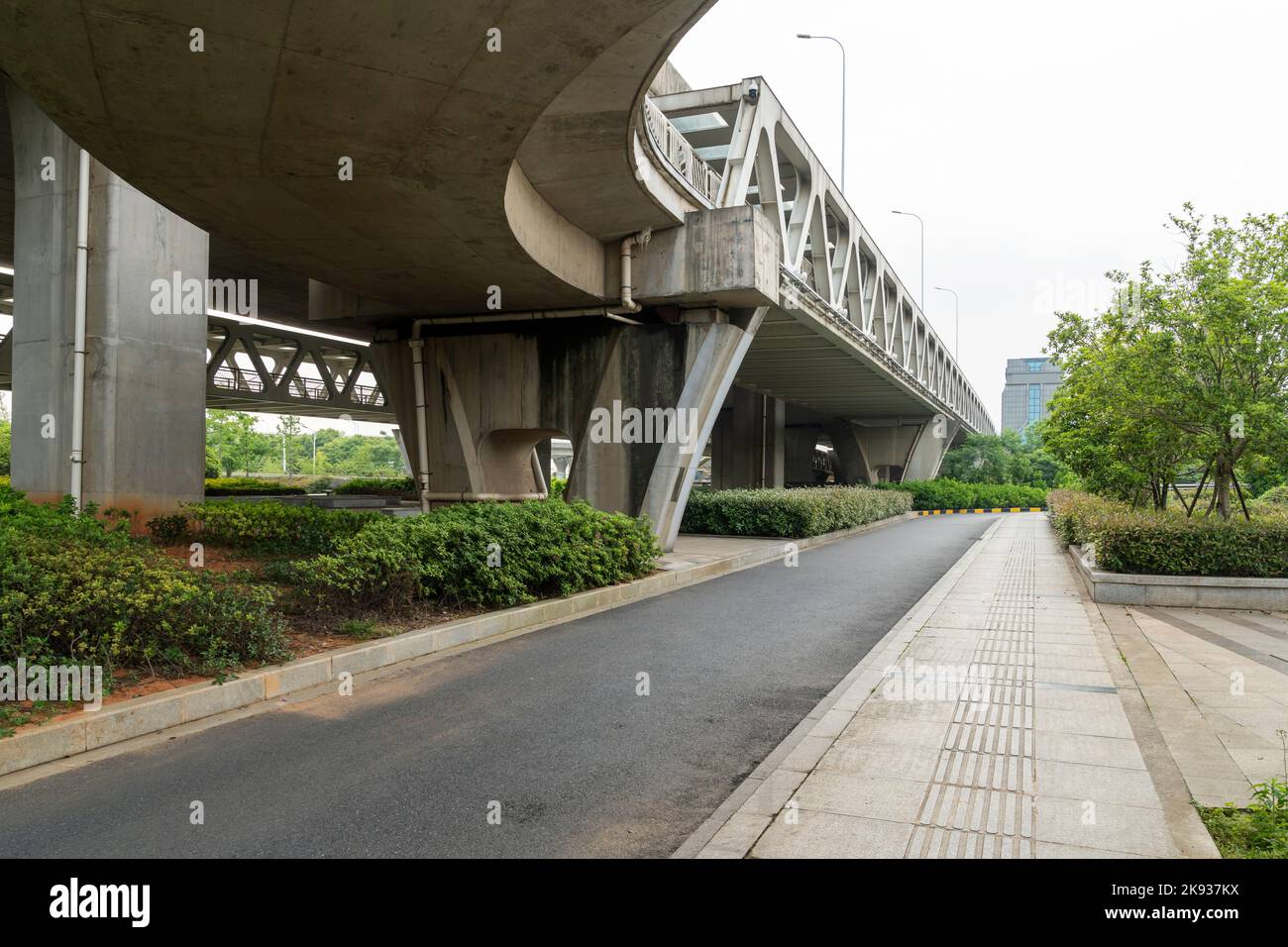 Concrete structure and asphalt road space under the overpass in the ...