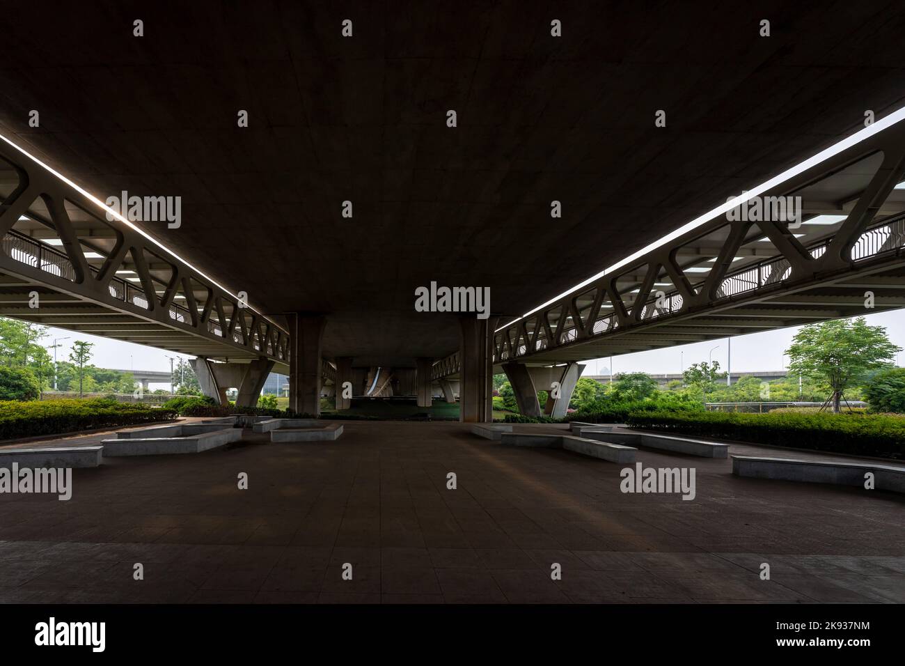 Concrete structure and asphalt road space under the overpass in the ...