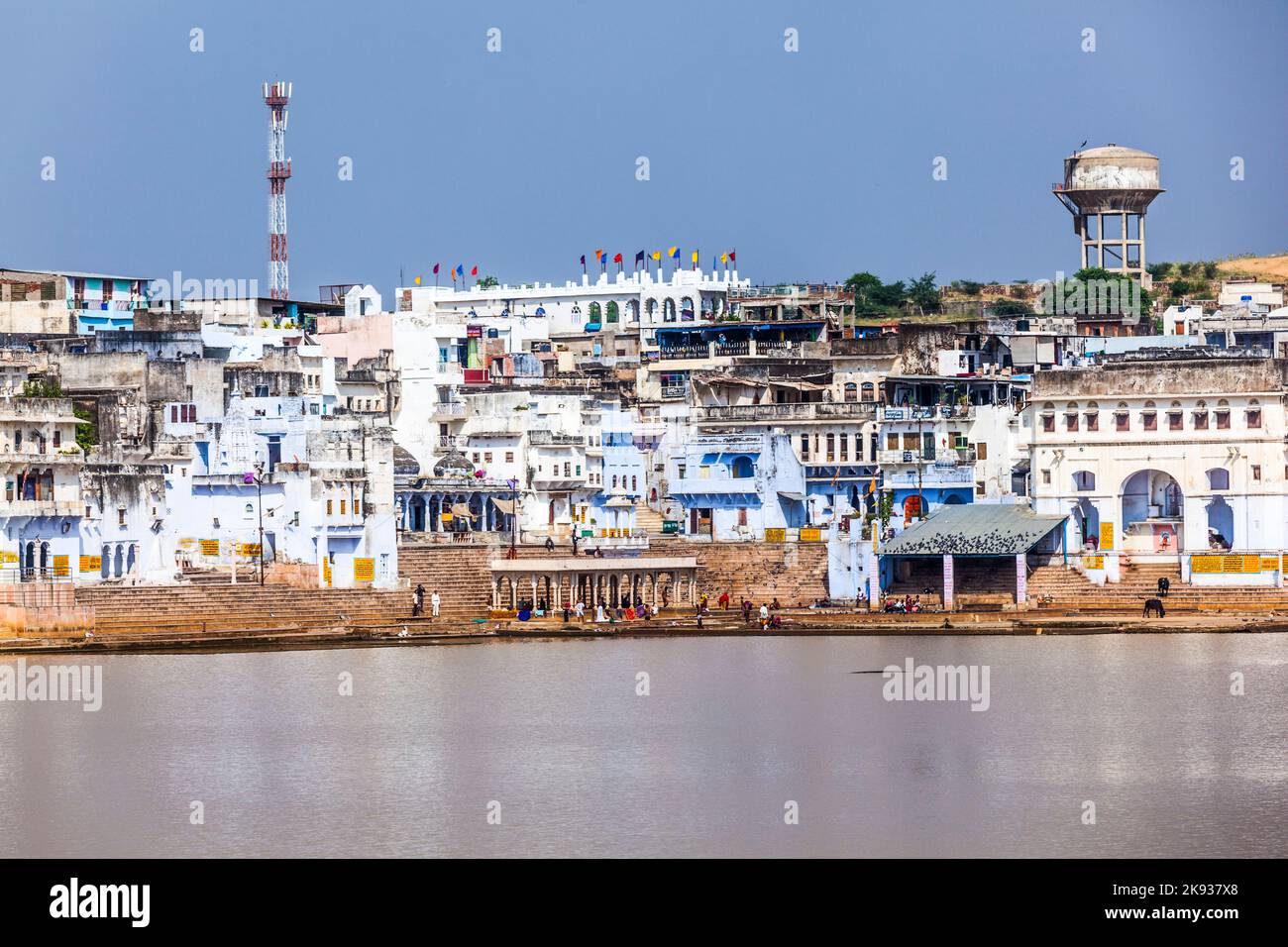 PUSHKAR, INDIA - OCTOBER 20, 2012: Pilgrims take ritual bathing in holy ...