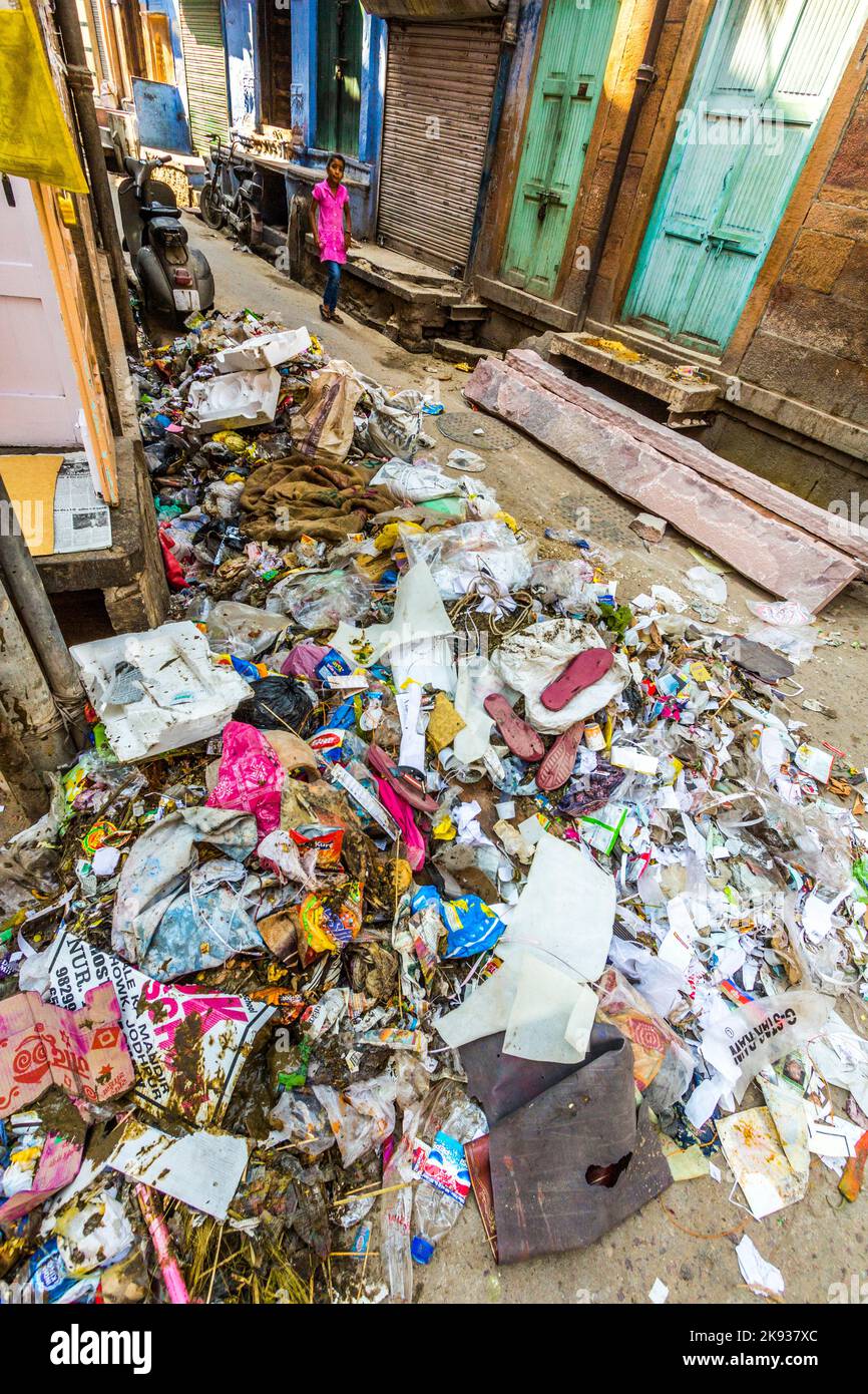 JODHPUR, INDIA - OCTOBER 23, 2012: litter and garbage in the street in ...