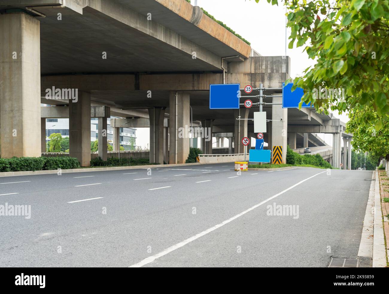 Concrete structure and asphalt road space under the overpass in the ...