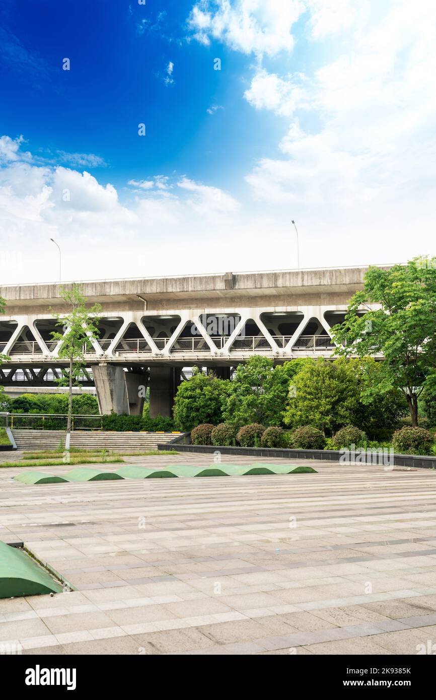 Concrete structure and asphalt road space under the overpass in the ...