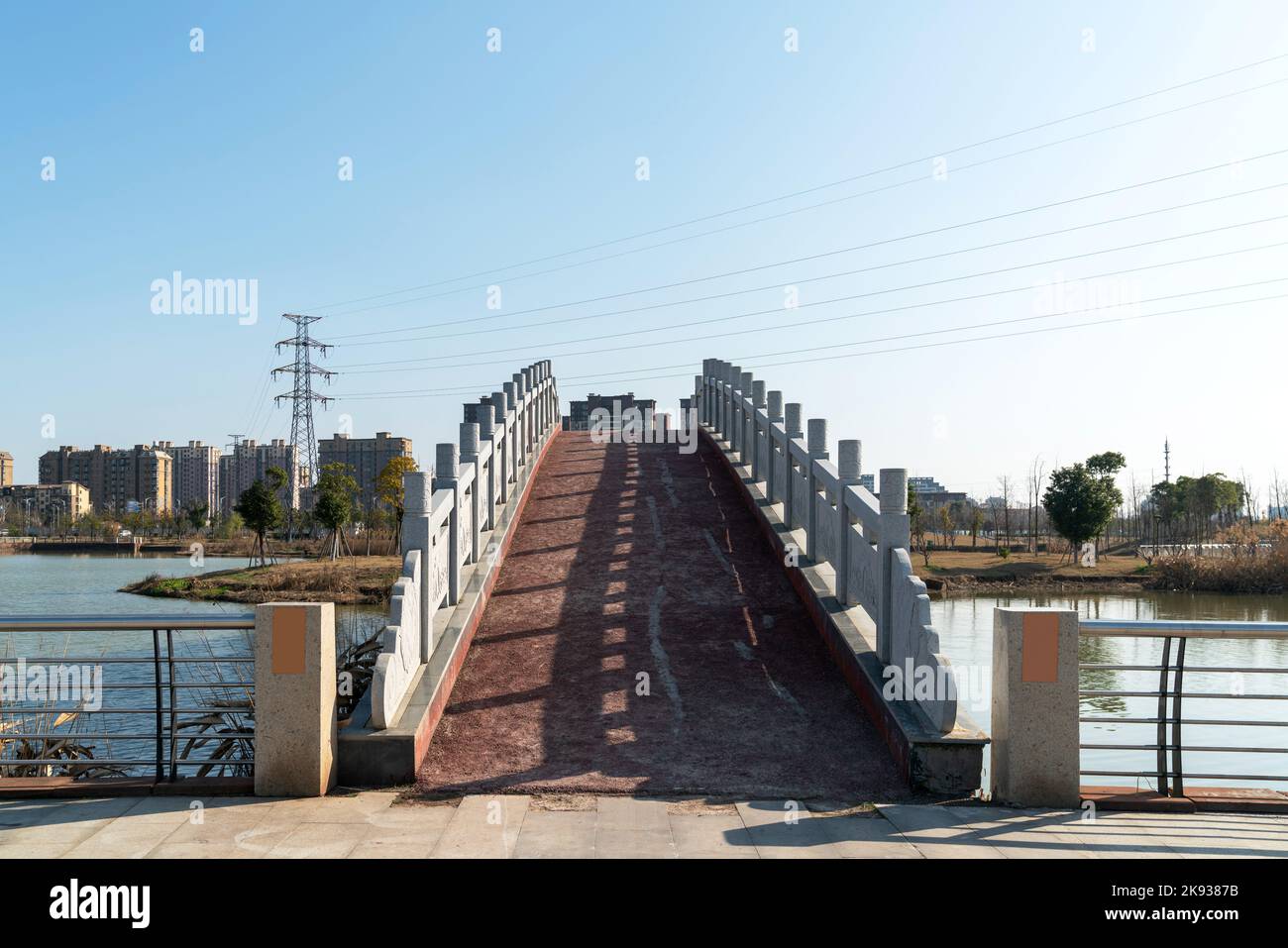 stone footbridge in an Asian garden Stock Photo - Alamy