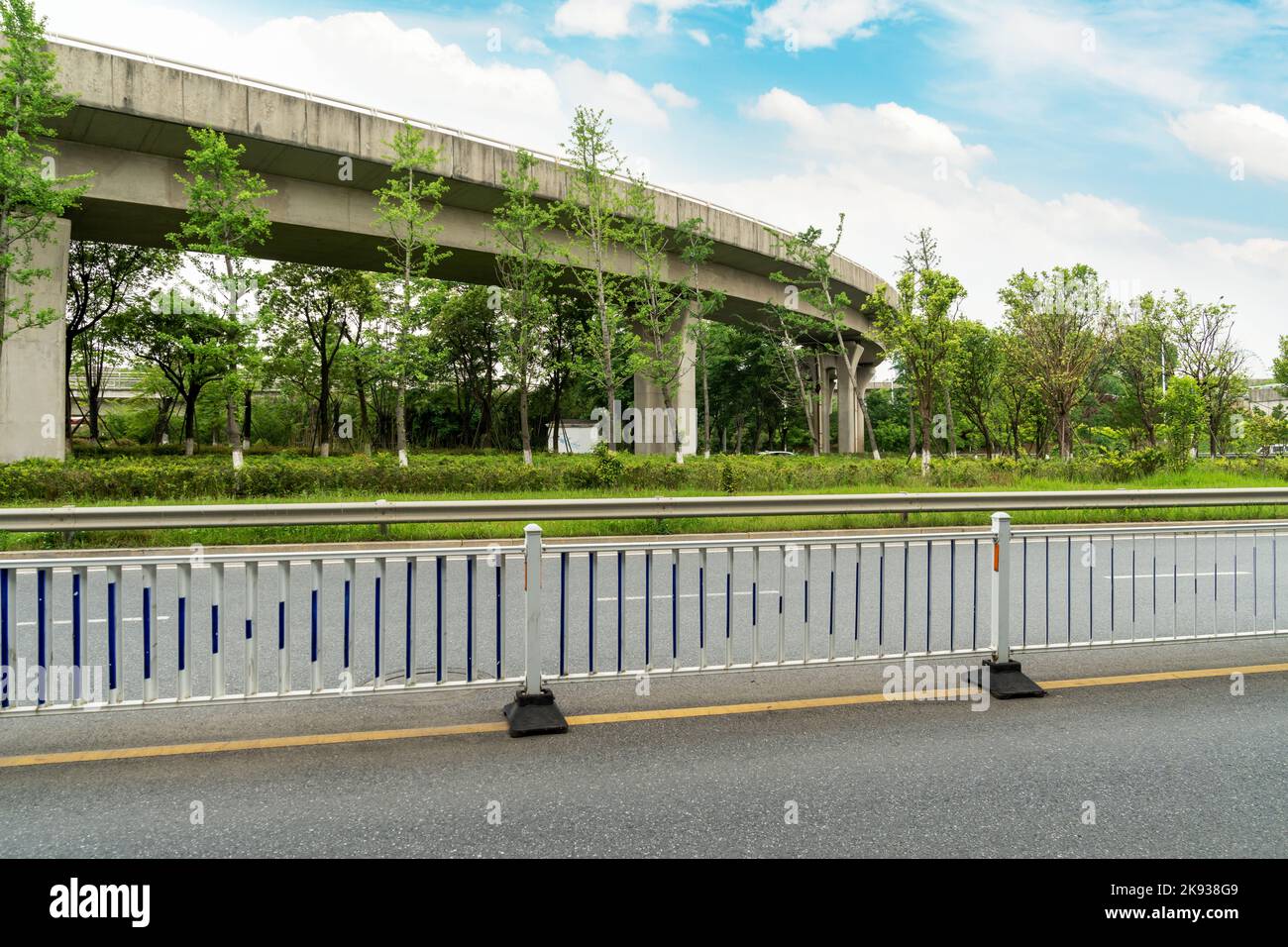Concrete structure and asphalt road space under the overpass in the ...