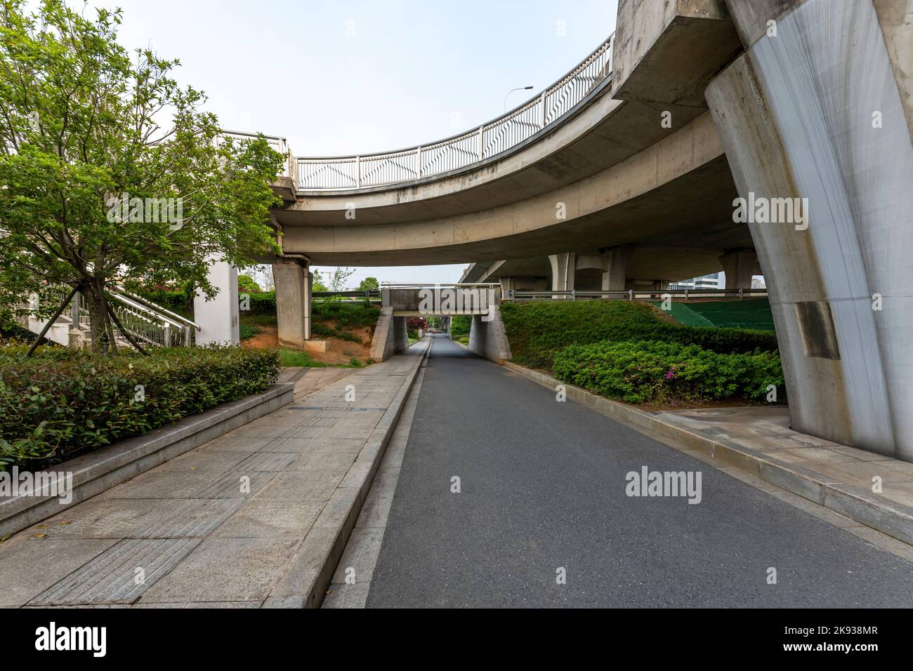 Concrete structure and asphalt road space under the overpass in the ...