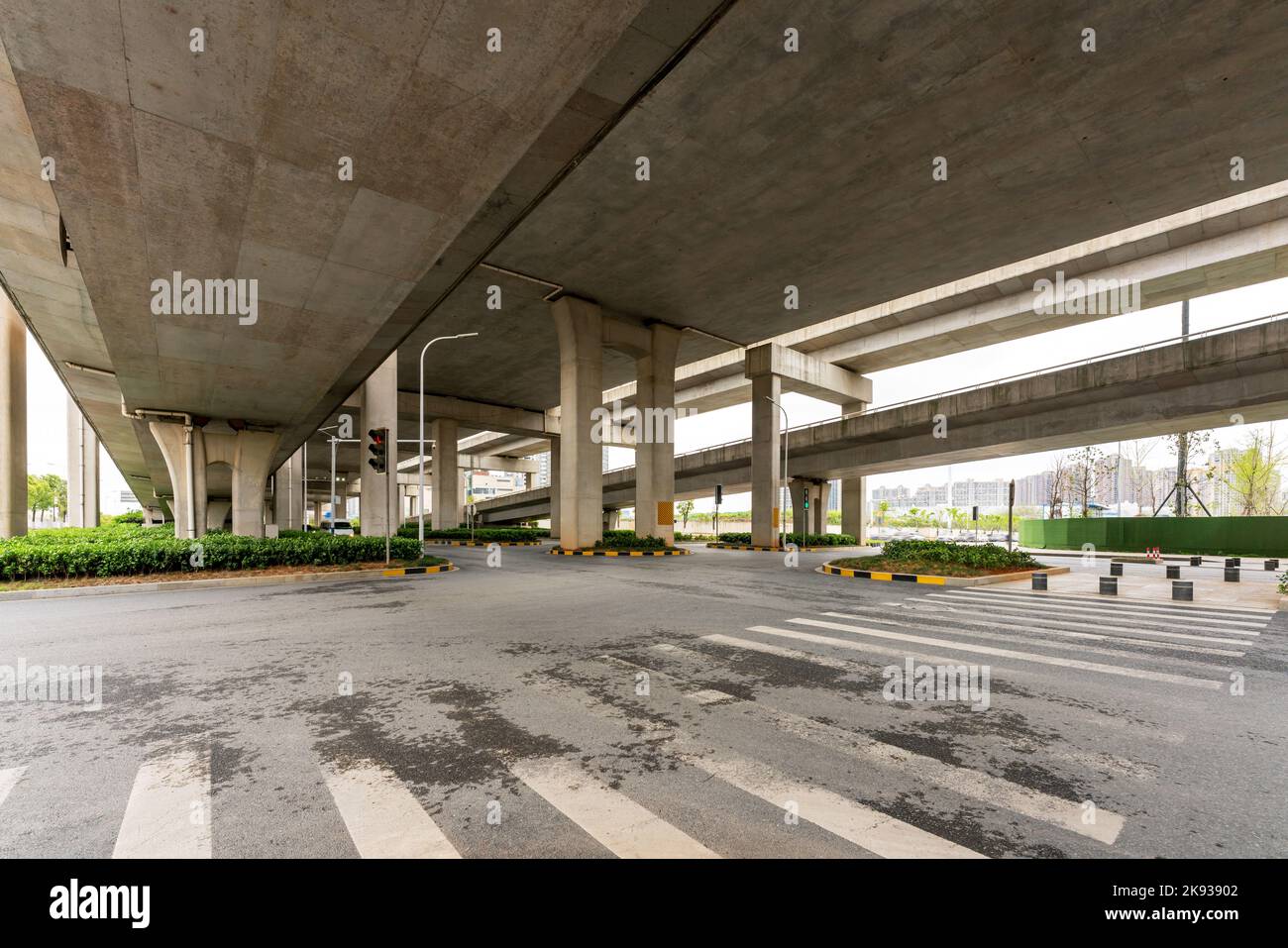 Concrete structure and asphalt road space under the overpass in the ...