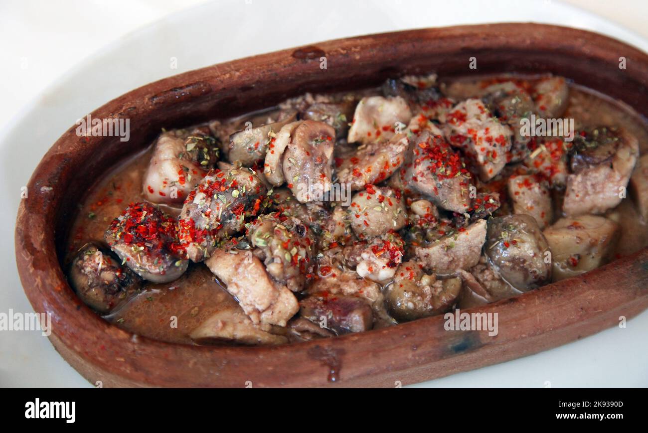 Kidney stew (Turkish: Bobrek Guvec) on the stew plate Stock Photo - Alamy