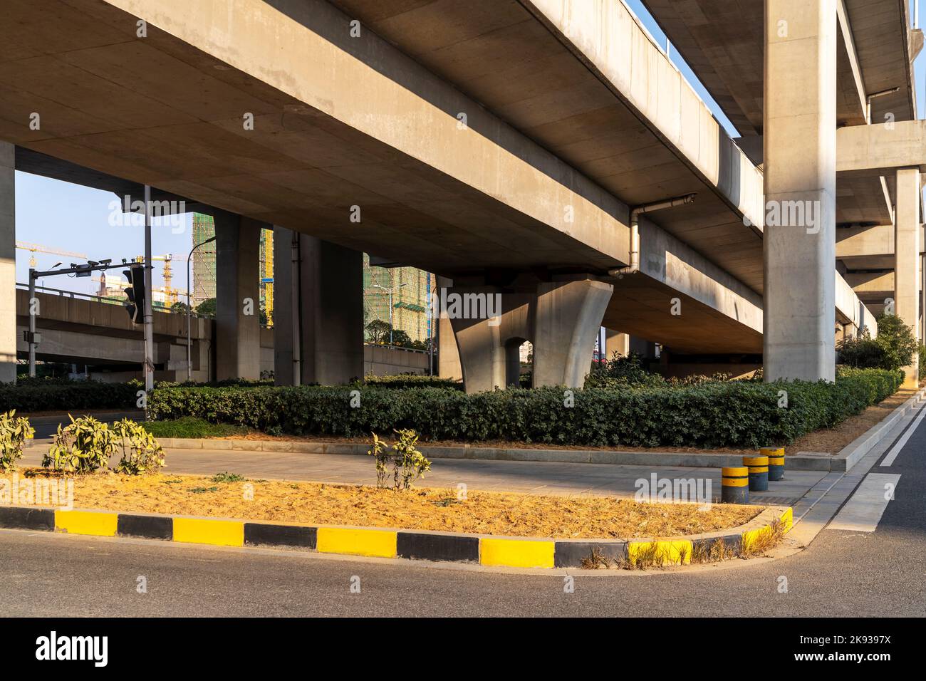 Concrete structure and asphalt road space under the overpass in the ...