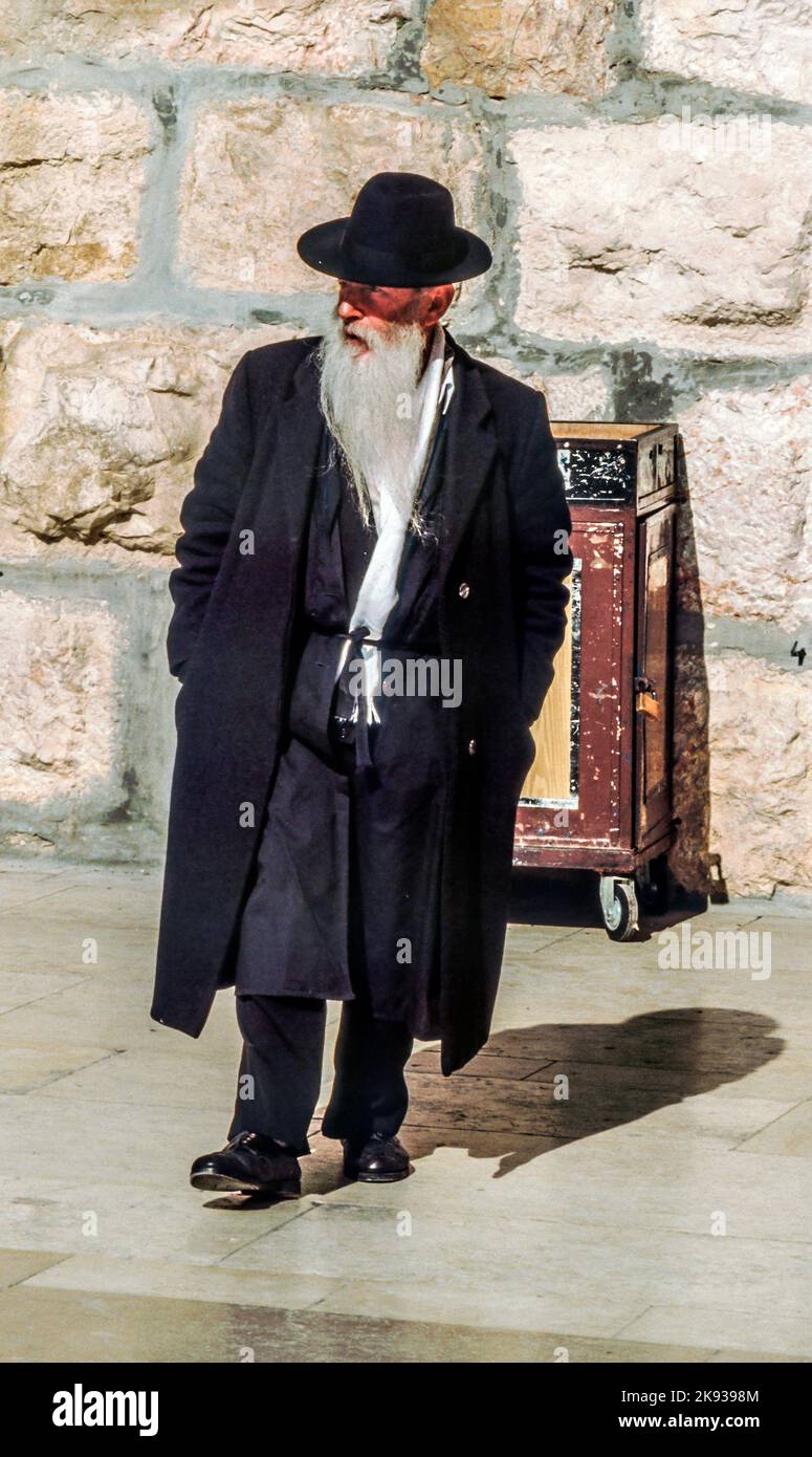 JERUSALEM - JAN 1,1994: Orthodox jewish man prays at the Western Wall ...