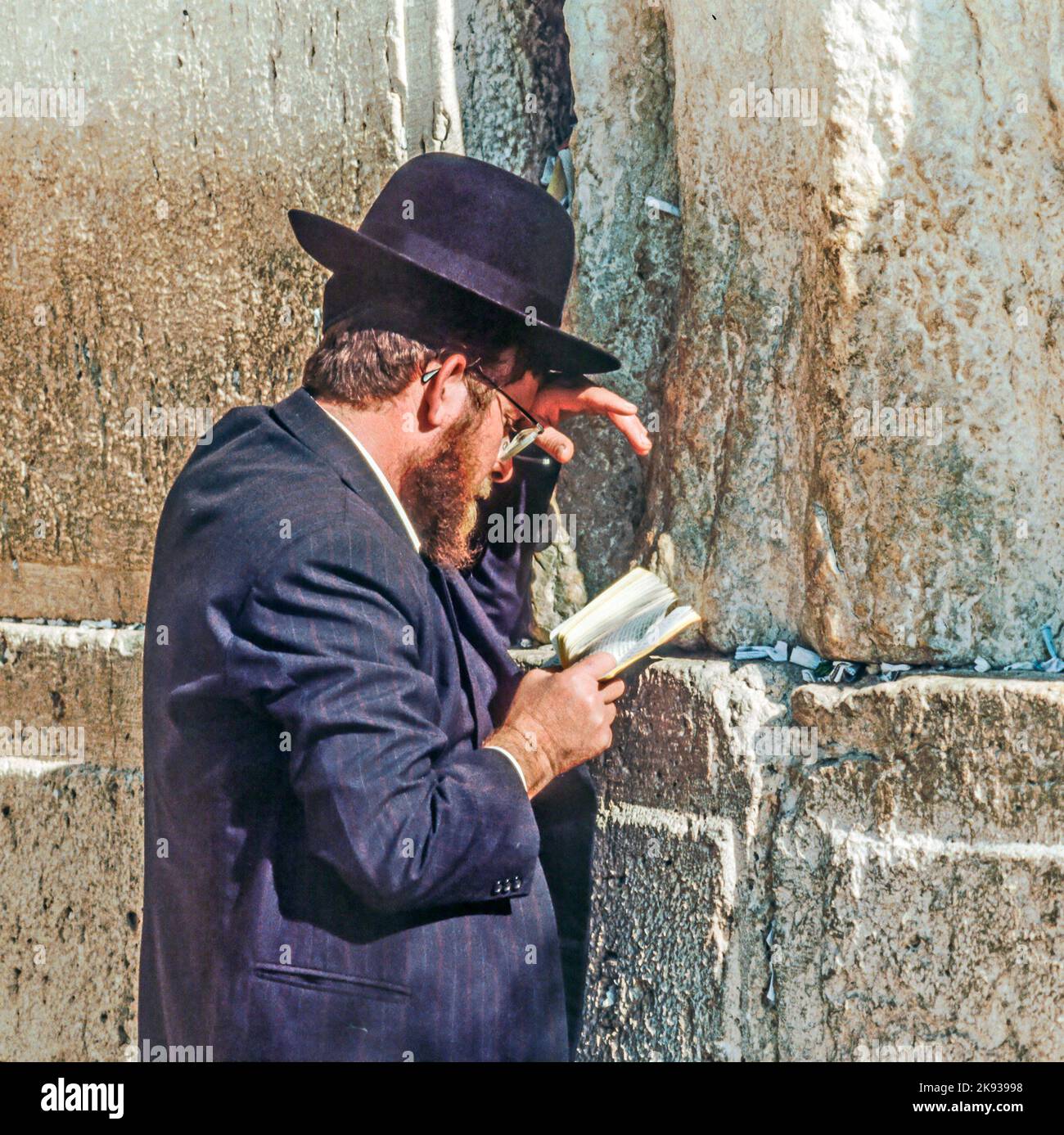 JERUSALEM - JAN 1,1994: Orthodox jewish man prays at the Western Wall ...