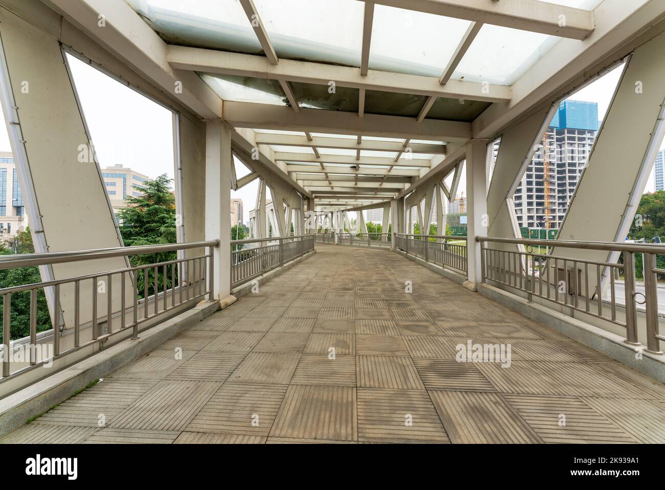 Inside of a modern overhead pedestrian bridge Stock Photo - Alamy