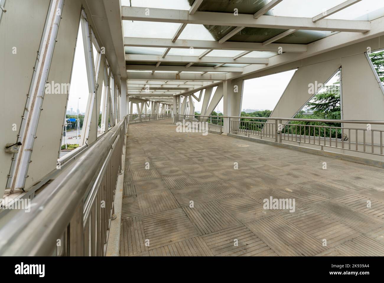 Inside of a modern overhead pedestrian bridge Stock Photo - Alamy