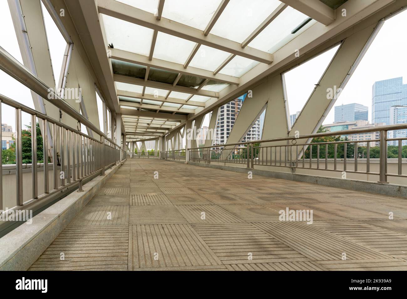 Inside of a modern overhead pedestrian bridge Stock Photo - Alamy
