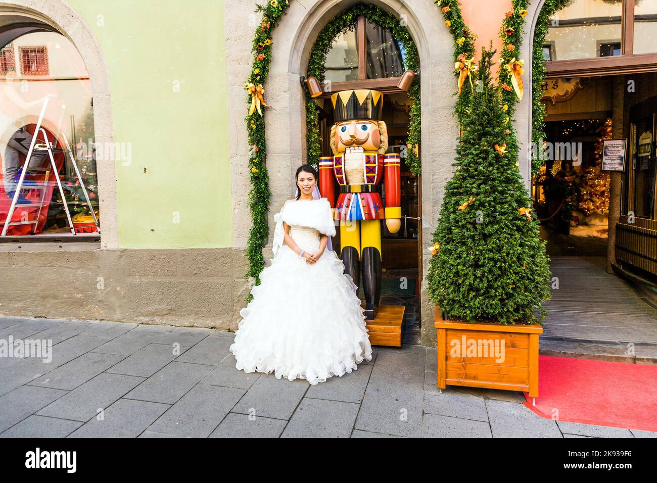 ROTHENBURG; GERMANY - OCT 8: japanese woman proudly presents her ...