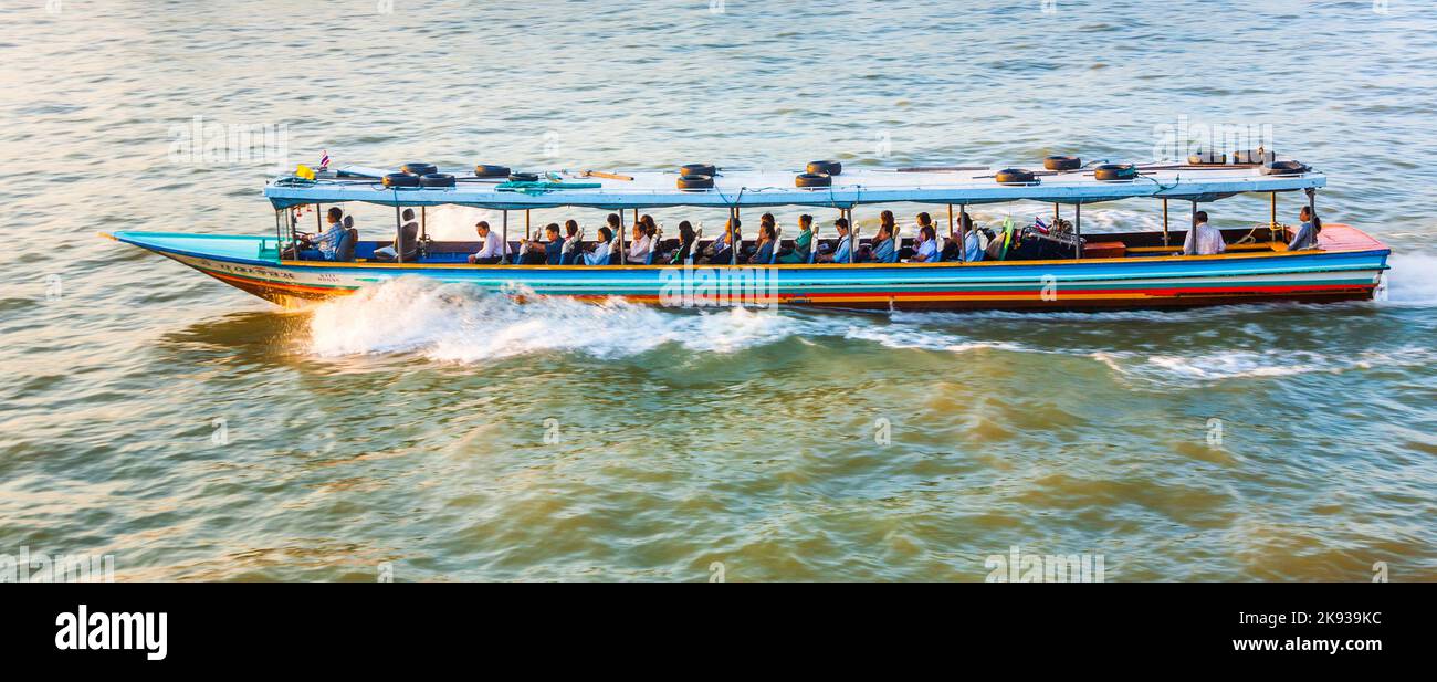 BANGKOK, THAILAND - DEC 23: people in the boat at the river Mae Nam ...
