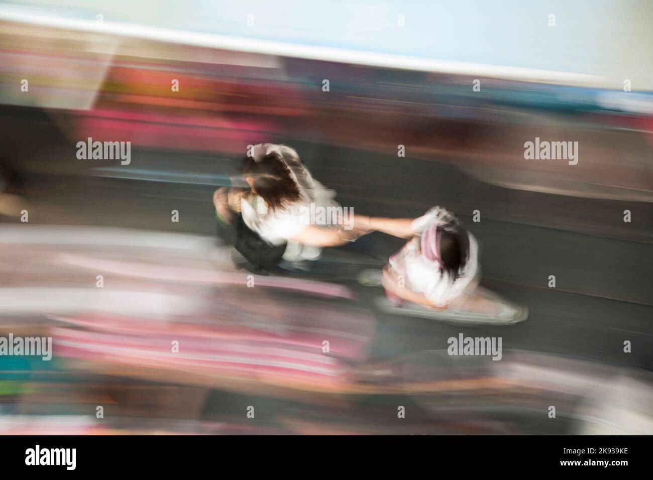 BANGKOK, THAILAND - DEC 22: people in motion at the sidewalk on Dec 22 ...