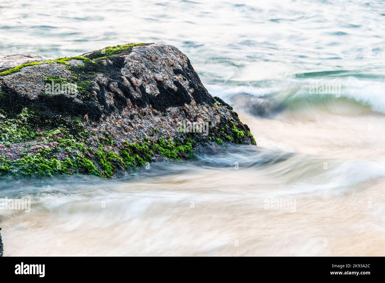 Stone in the water at Red Beach Urca in Rio de Janeiro Brazil Stock ...