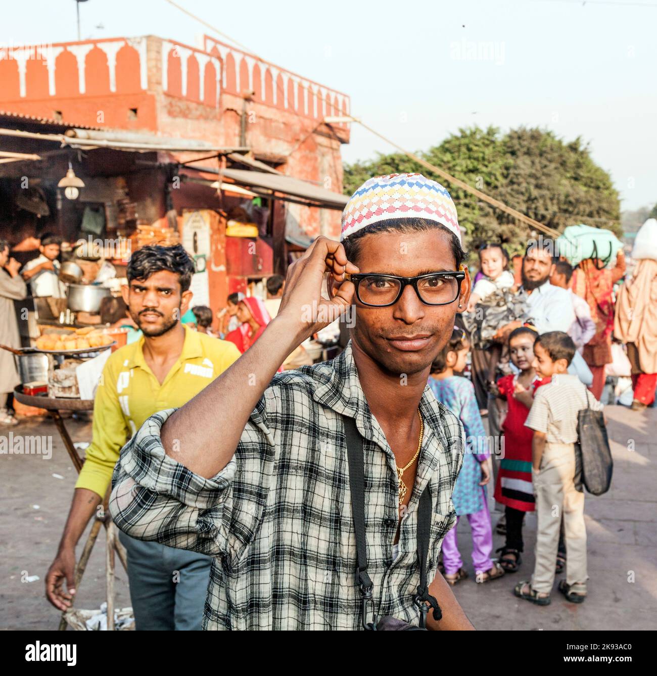 DELHI - NOV 8, 2011: portrait of young man with modern glasses at the ...